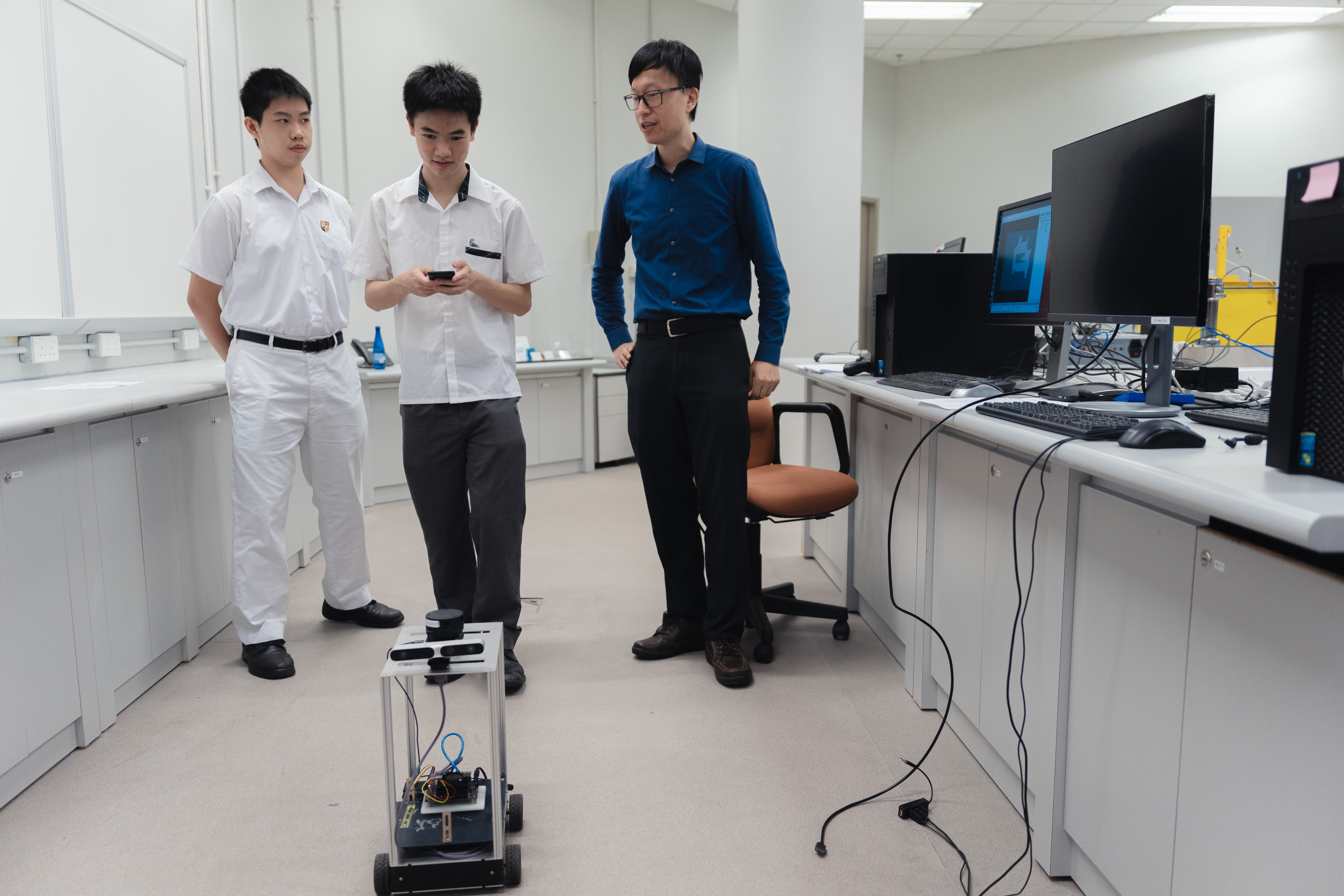 Dr Henry Chu Guides High School Students in developing a self-driving ...